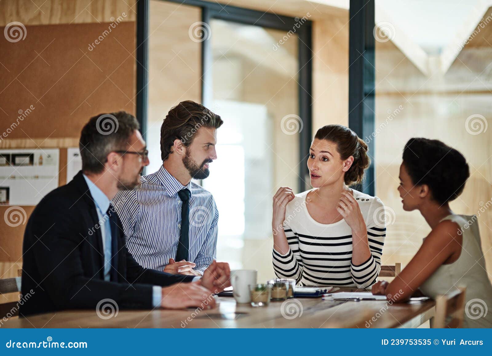 Planning Session in Progress. Portrait of a Group of Colleagues Talking ...