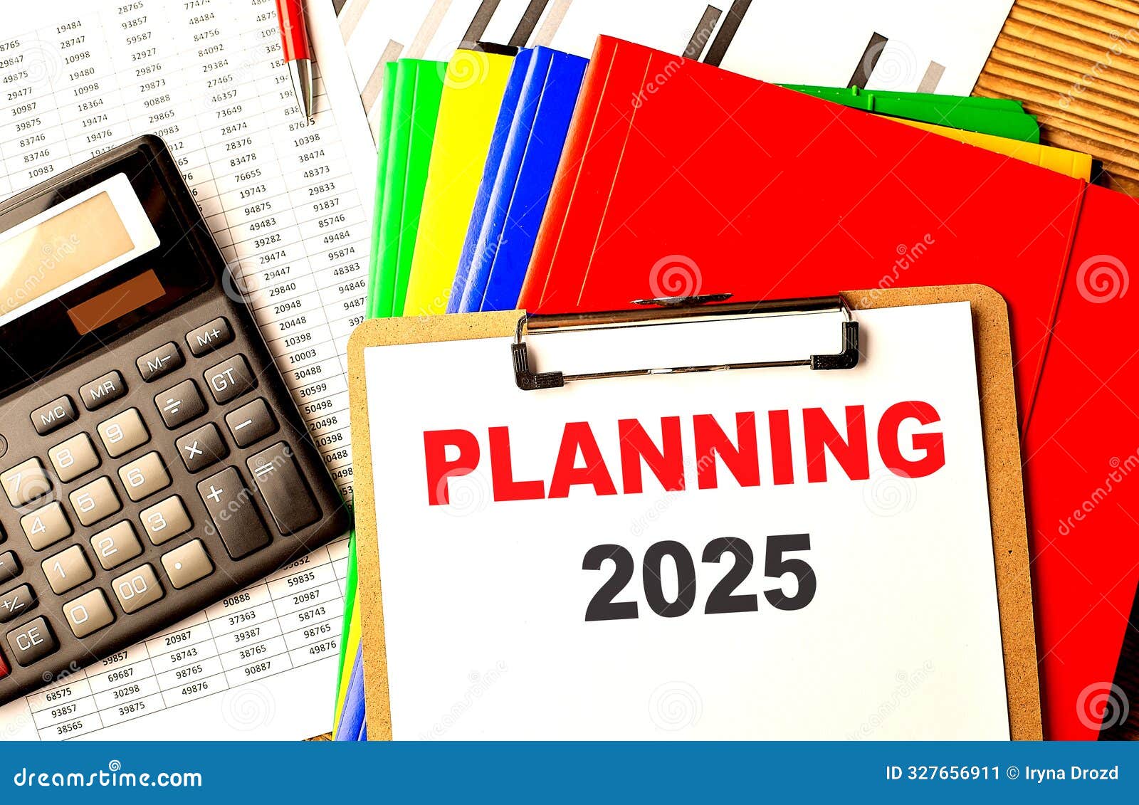 PLANNING 2025 Text on Clipboard with Calculator and Color Folder Stock ...