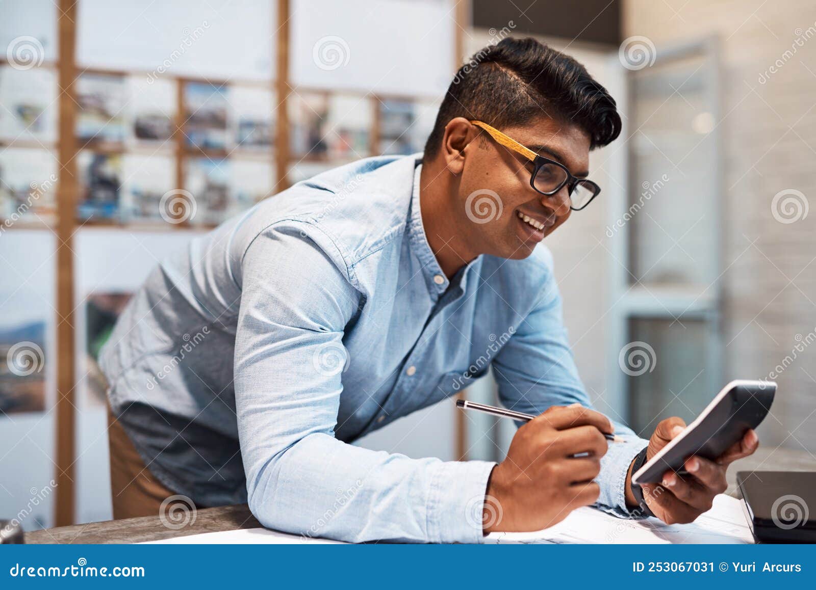 Planning the Way To a Profitable Day. a Young Architect Using a ...
