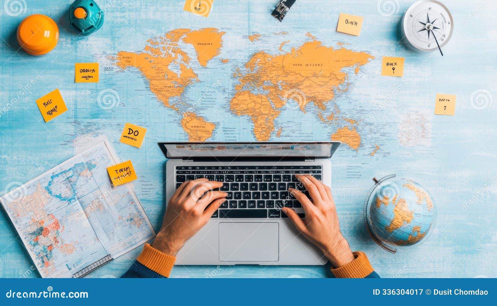 Planning World Tour with Laptop and Maps on Desk Stock Image - Image of ...