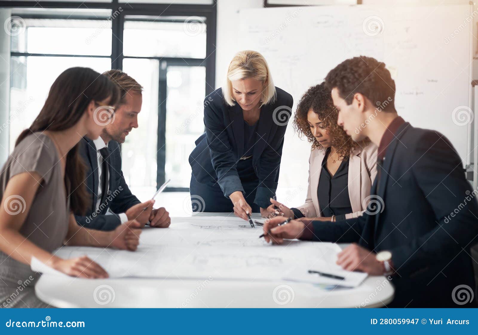 These Plans Need More Precision. a Team of Professionals Working on ...