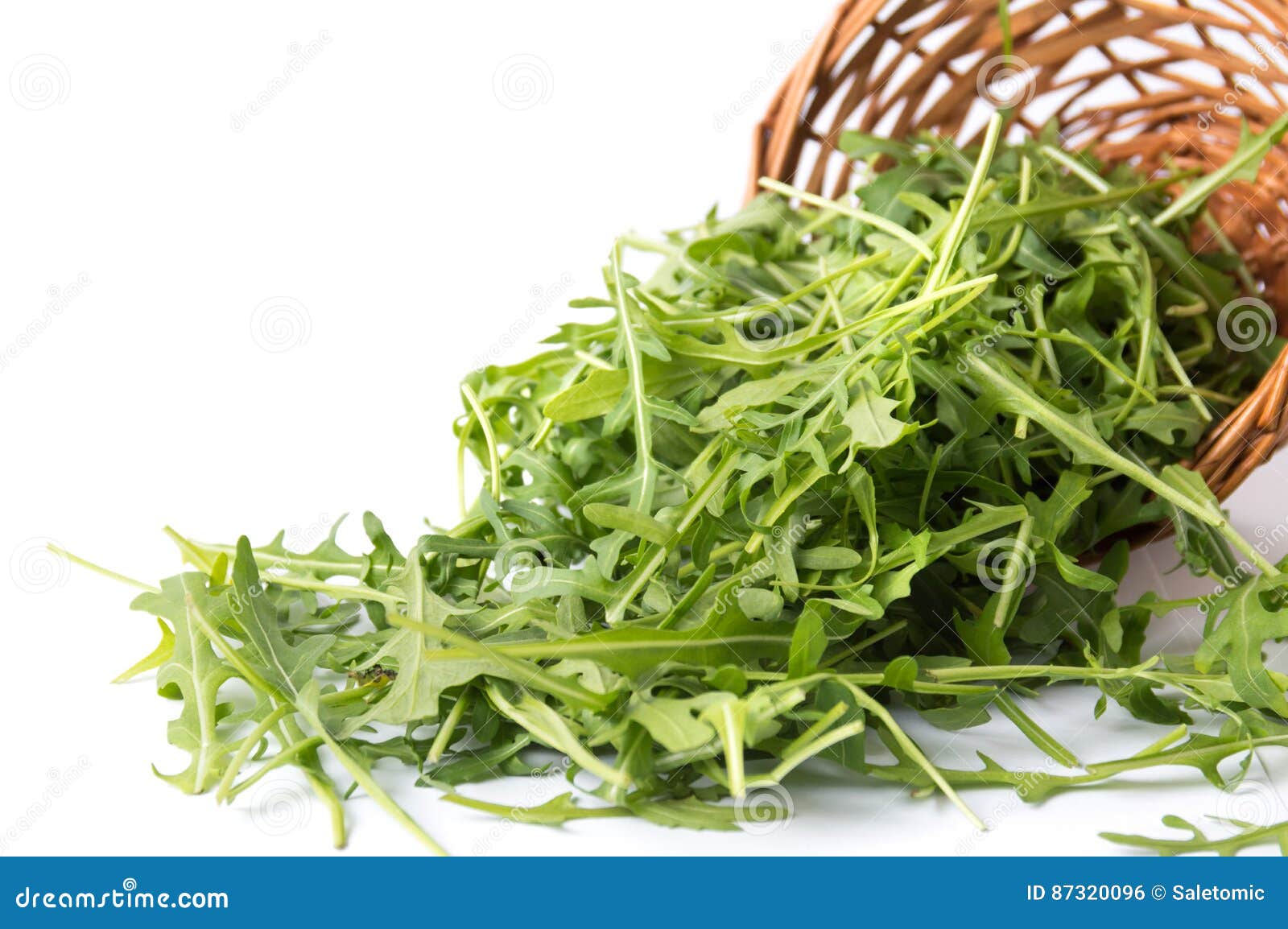 Planta De Rucola En Un Cuenco De Mimbre Foto de archivo - Imagen de ...