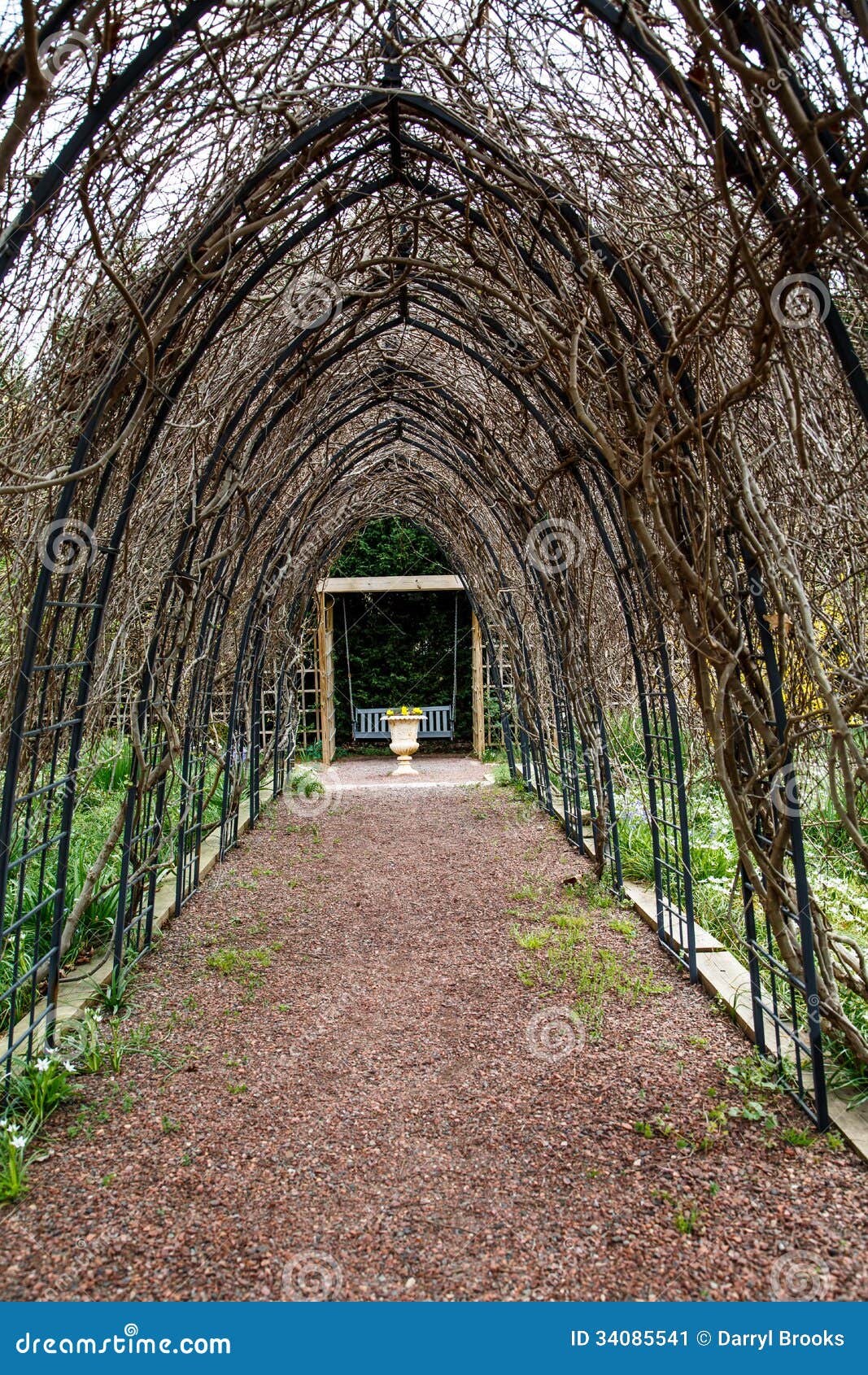 Planter and Swing Past Arbor in Winter Stock Image - Image of walkway ...