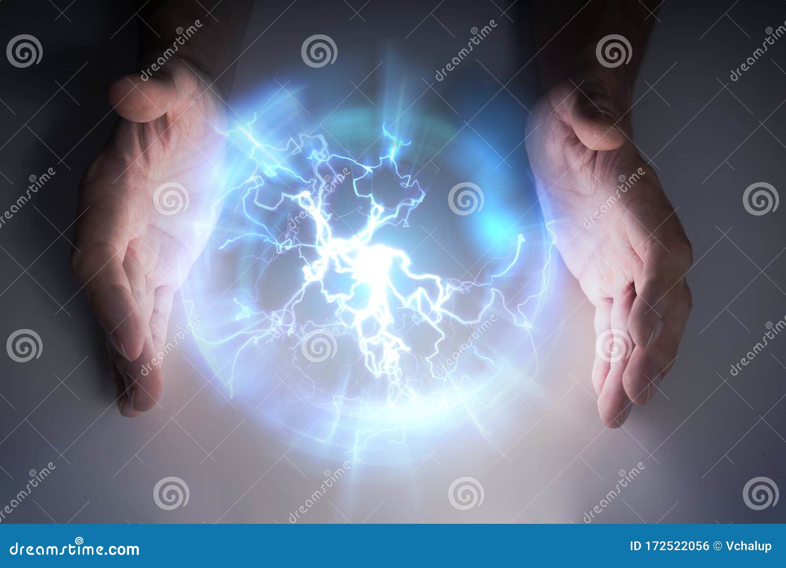 Plasma Ball with Lightning in Hands of Magician or Illusionist. Stock ...