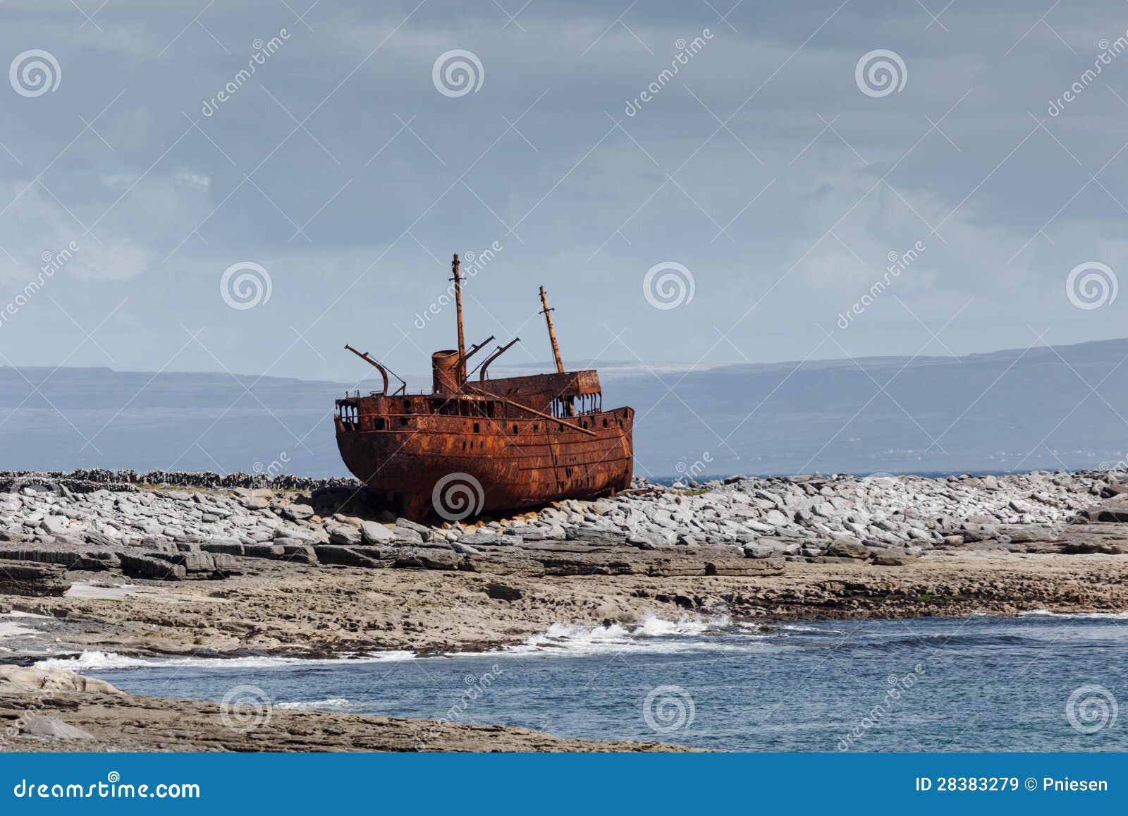 Plassey Rusted Shipwreck Hulk on Rocks at Low Tide Stock Image - Image ...