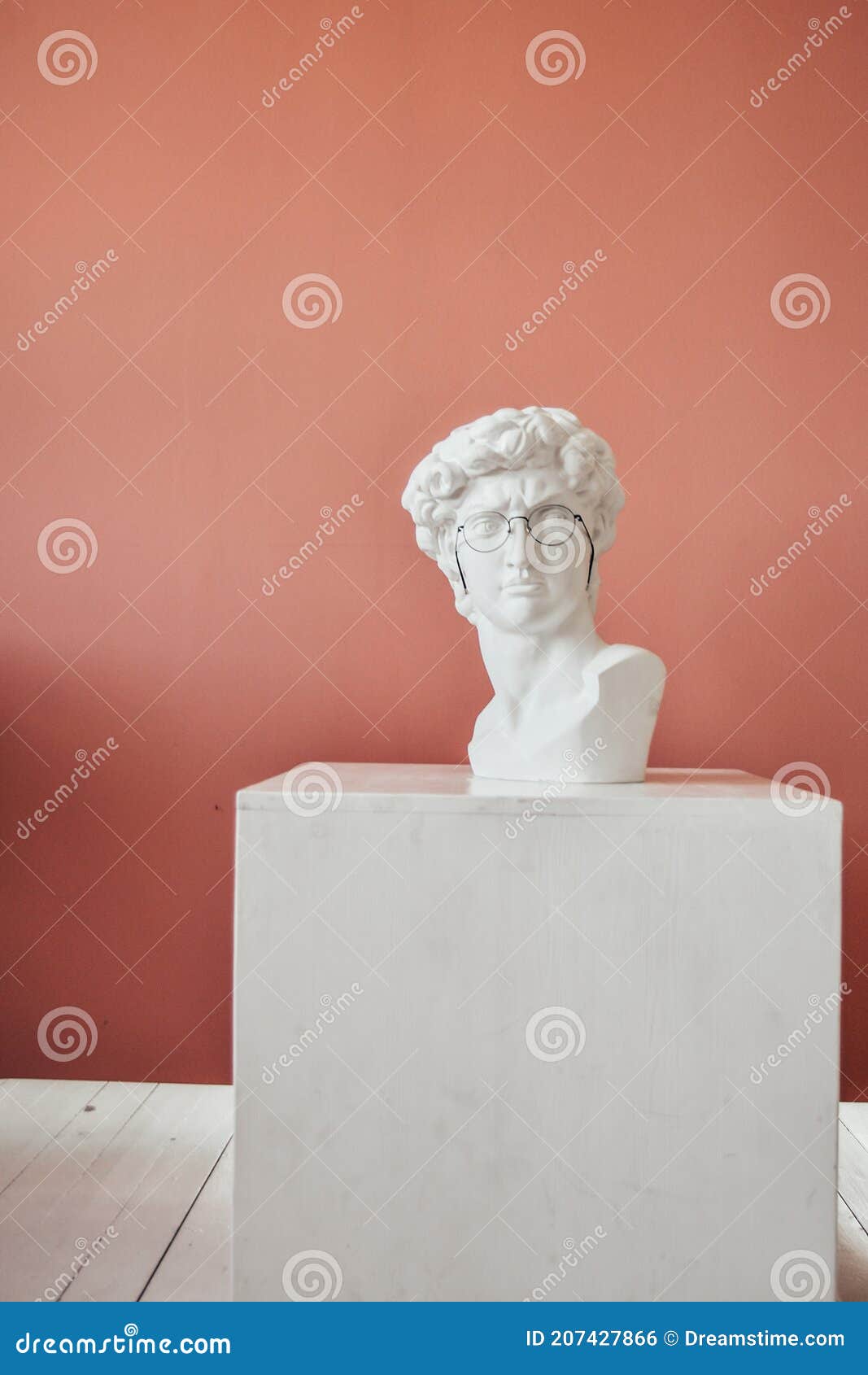 Plaster Bust of David with Glasses on a White Plaster Cube. Stock Photo ...