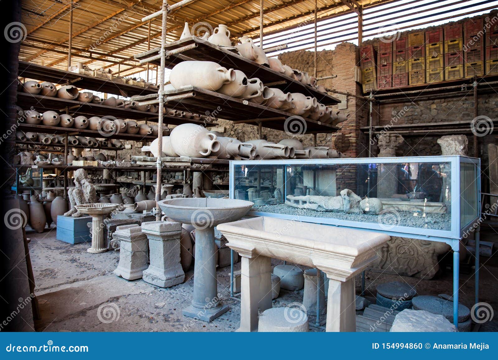 Plaster Cast of a Child and Artifacts in the Forum Granary of the ...
