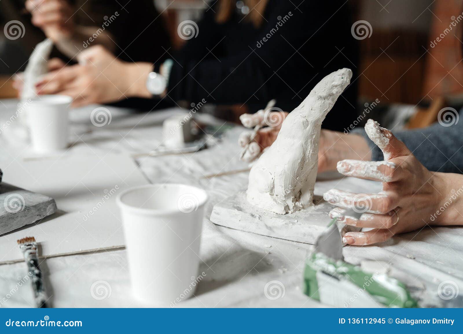 Plaster Casting Class. Women`s Hands Work with the Form Stock Image ...