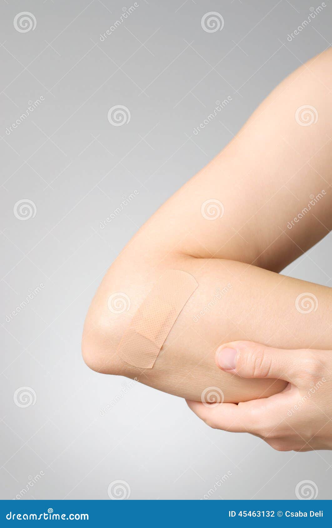 Plaster on female arm stock photo. Image of laceration - 45463132