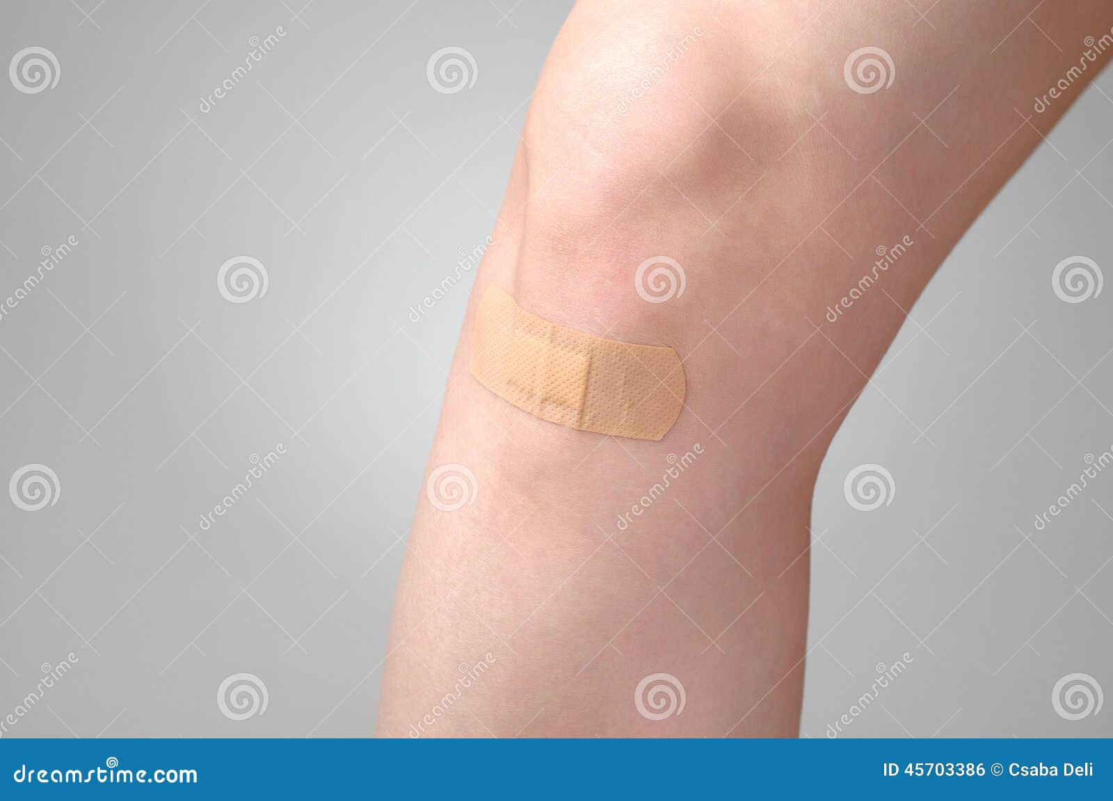 Plaster on female leg stock photo. Image of hurt, bandage - 45703386