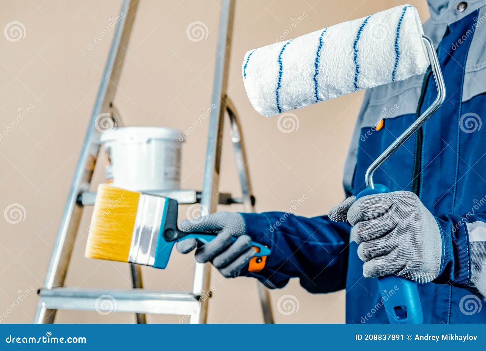 The Plaster Painter is Ready To Paint the Wall. in the Hands of a ...
