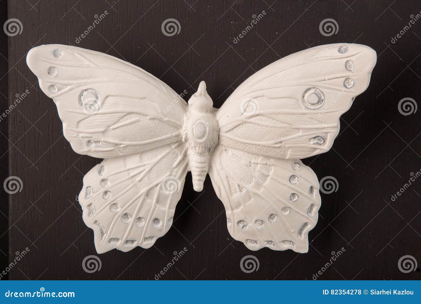 Plaster relief butterfly stock photo. Image of modern - 82354278