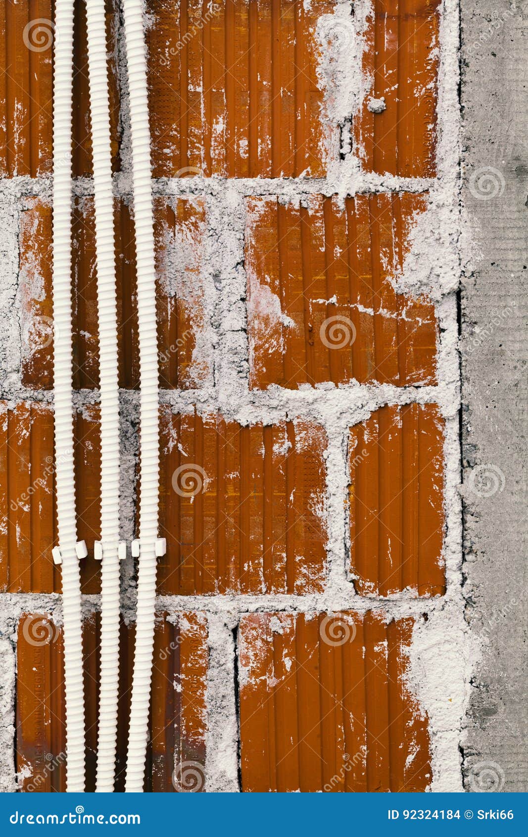 Plastered Brick Wall with Plastic Corrugated Tubes Stock Photo - Image ...