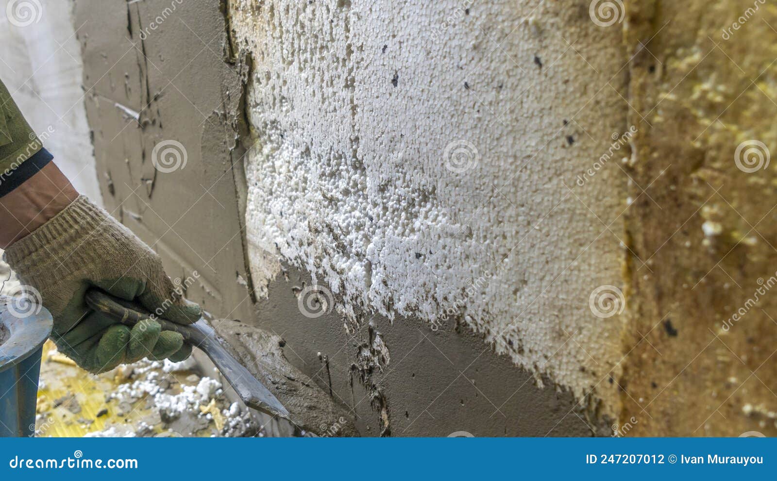 A Plasterer Applies Plaster with a Spatula To a Brick Wall. Wall ...