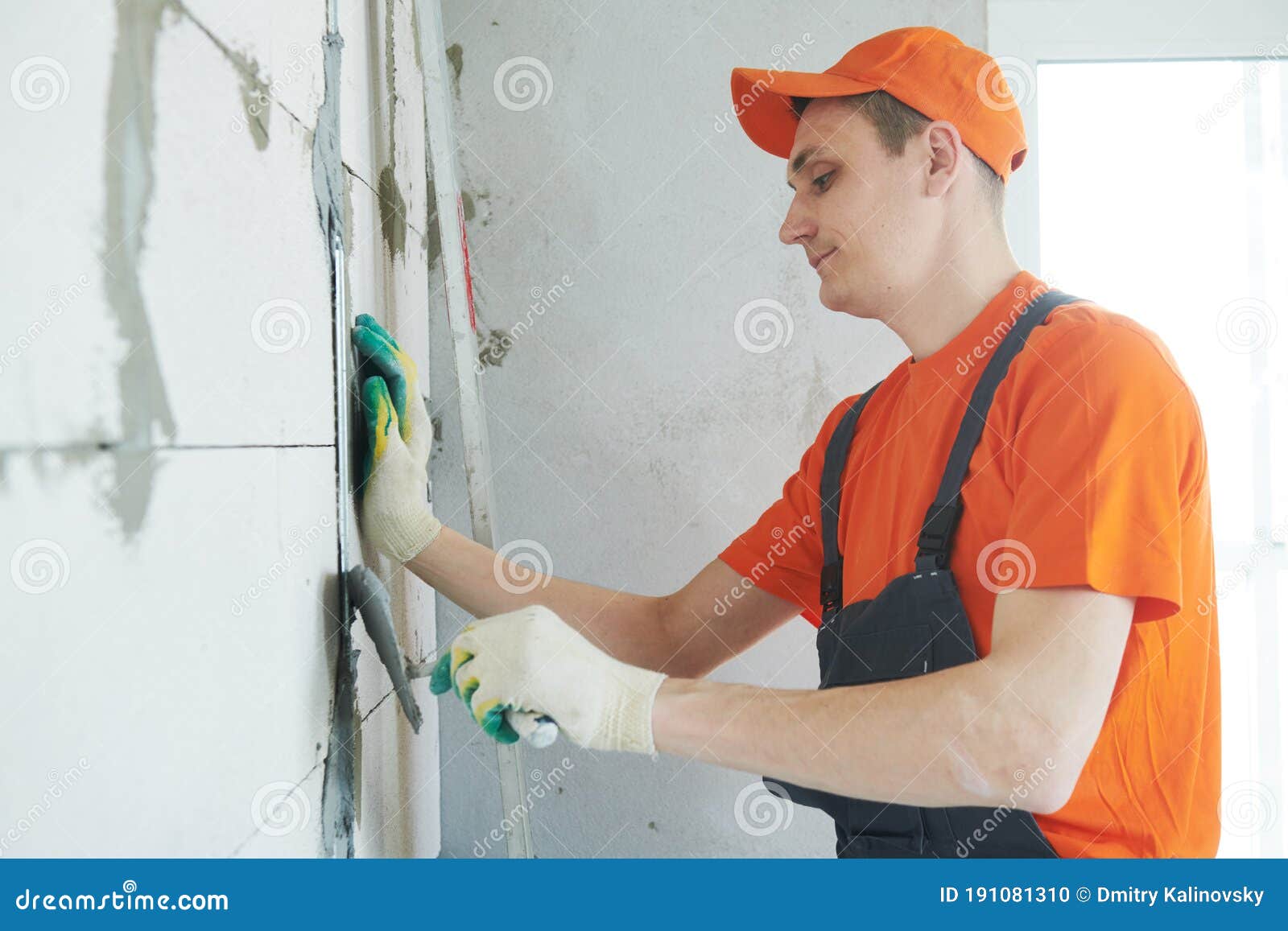 Plasterer Installing Screed on Wall for Plastering Stock Photo - Image ...