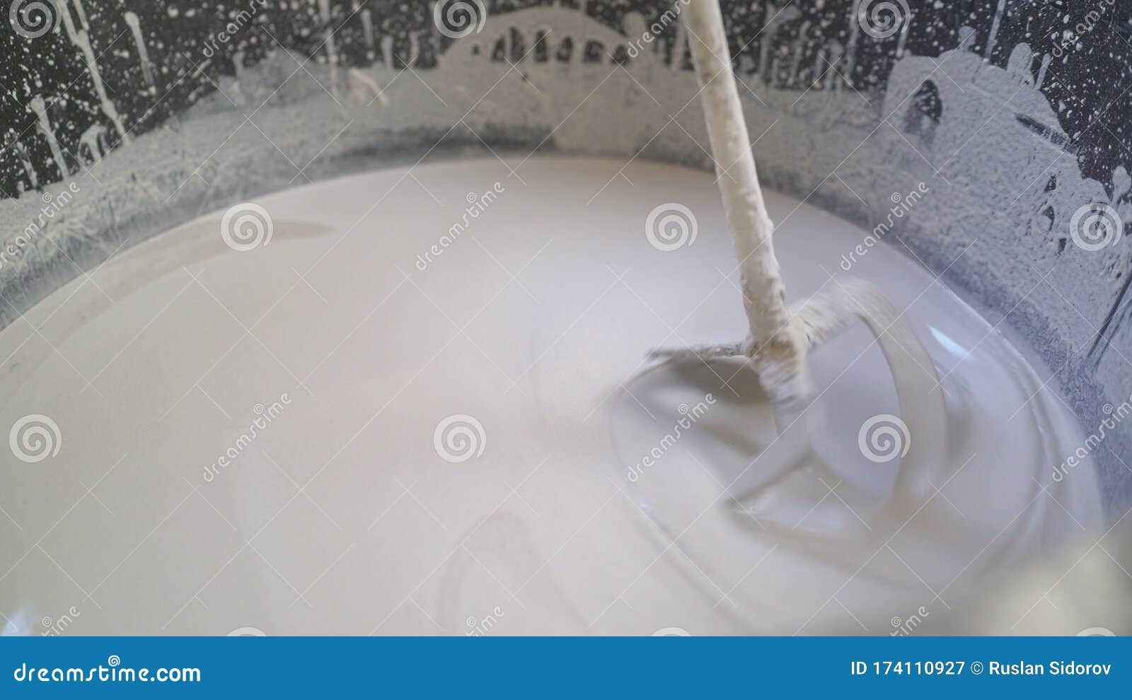 The Solution In The Bucket Is Mixed Using A Construction Mixer. Mixing ...
