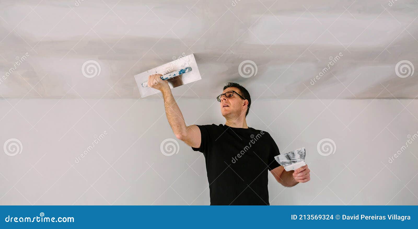Plasterer Smoothing Plaster Ceiling with the Trowel Stock Photo - Image ...