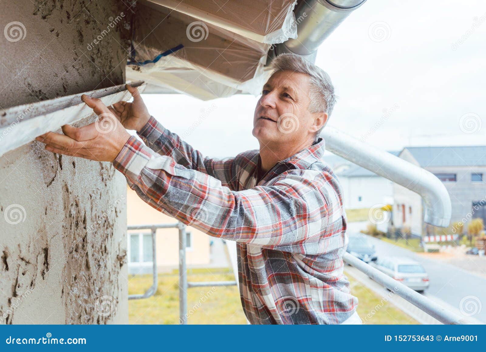 Plasterer Smoothing Plaster on a Facade Stock Image - Image of plaster ...