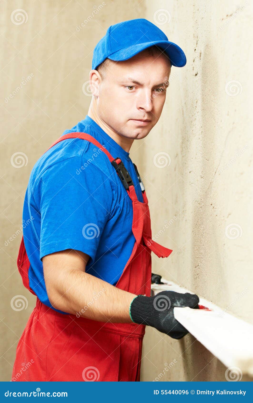 Plasterer at work stock photo. Image of plasterboard - 55440096