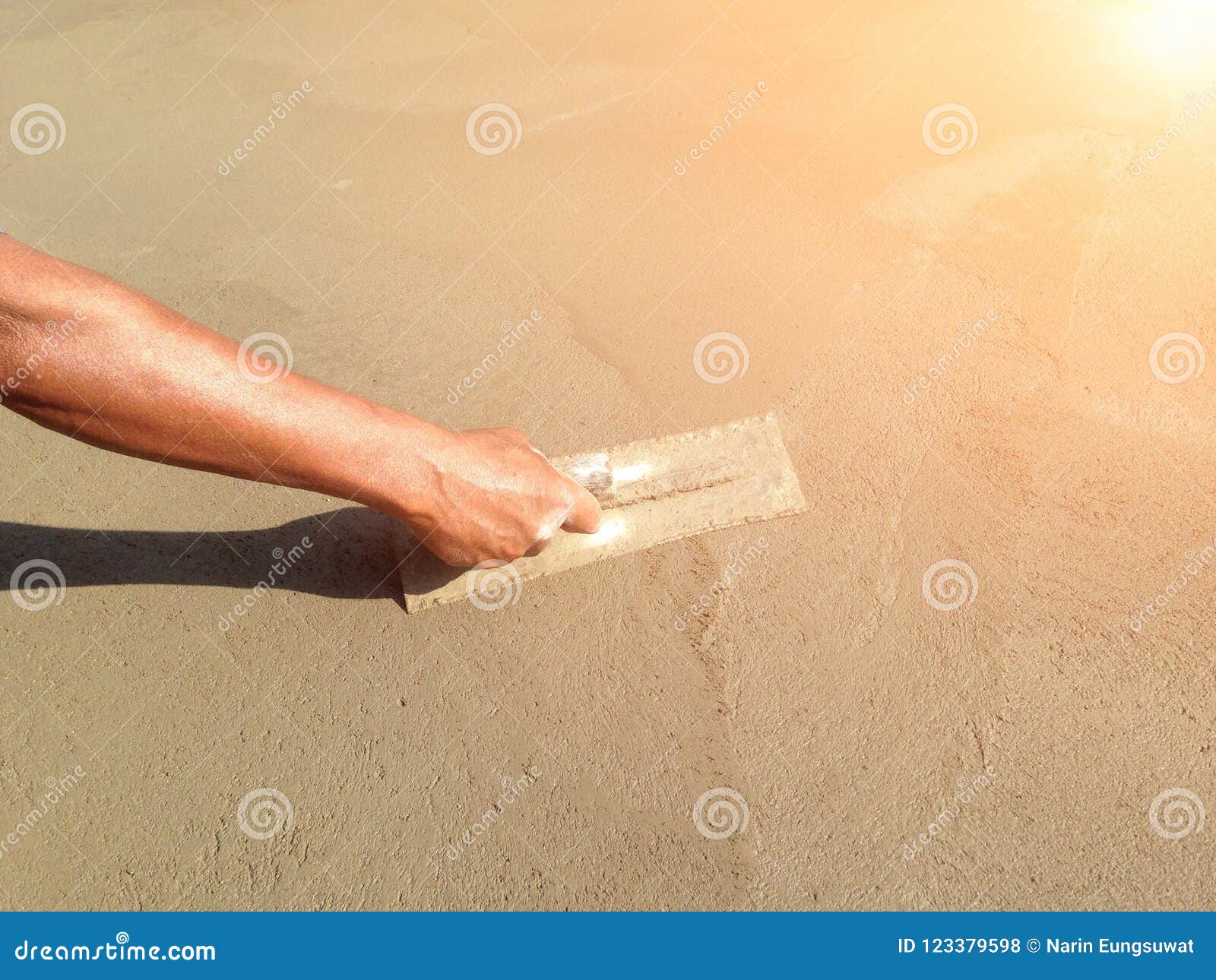 Plastering Construction Work by the Expert with Sunlight. Cement Work ...