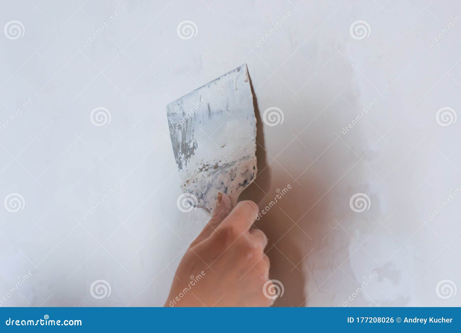 Plastering Man Hand with Plaste and Plaster Spatula Trowel in Wall ...