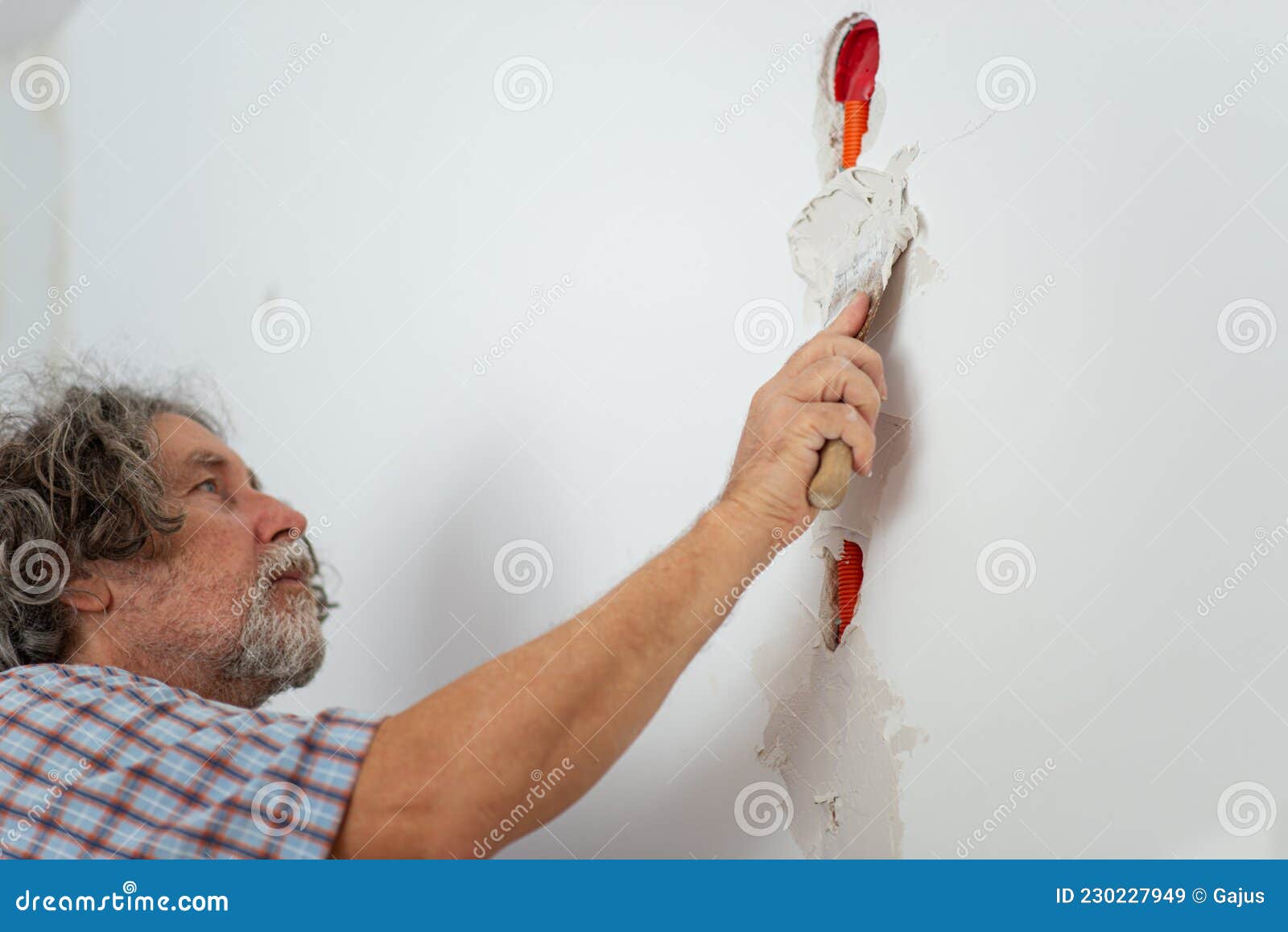 Plastering Orange Corrugated Tube into a Wall Stock Image - Image of ...