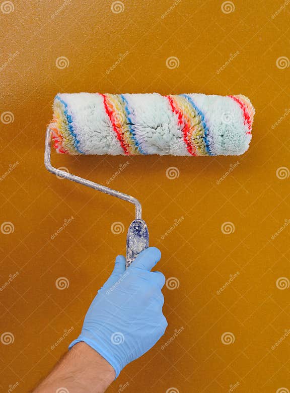 Plastering using a roller stock photo. Image of worker - 65103262