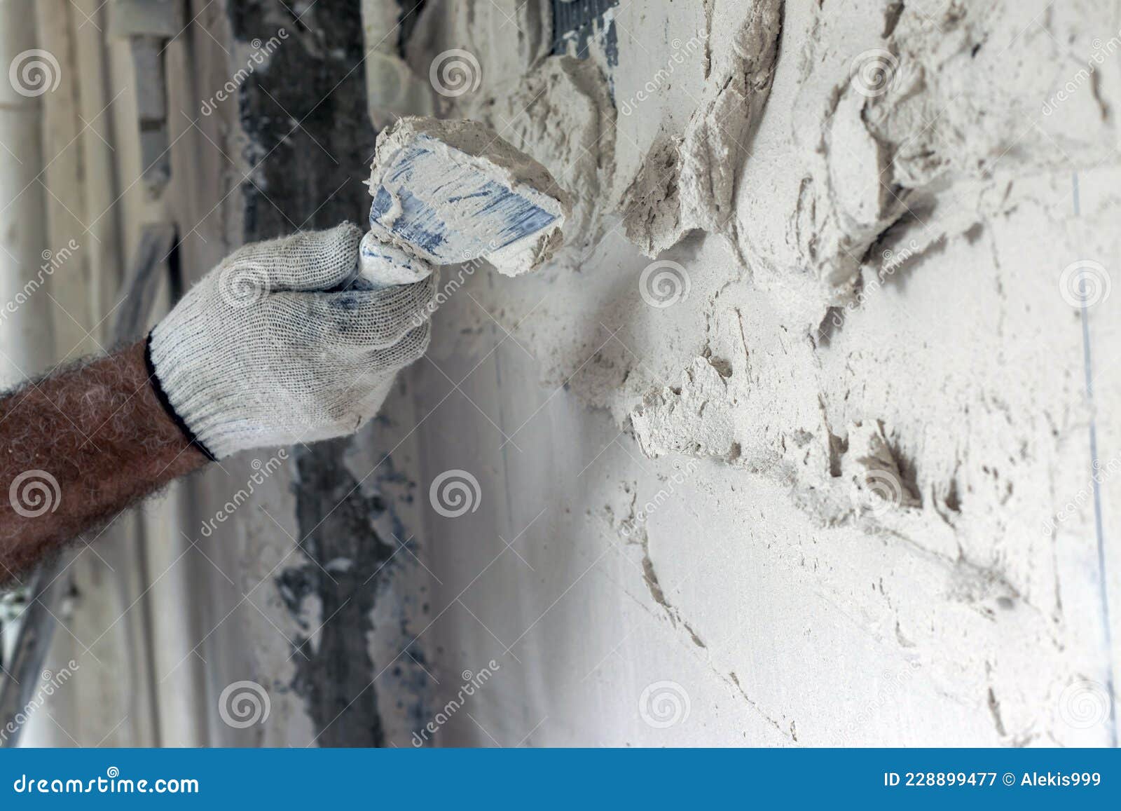 Plastering Walls Using Gypsum Plaster and Rules. the Worker Levels the ...