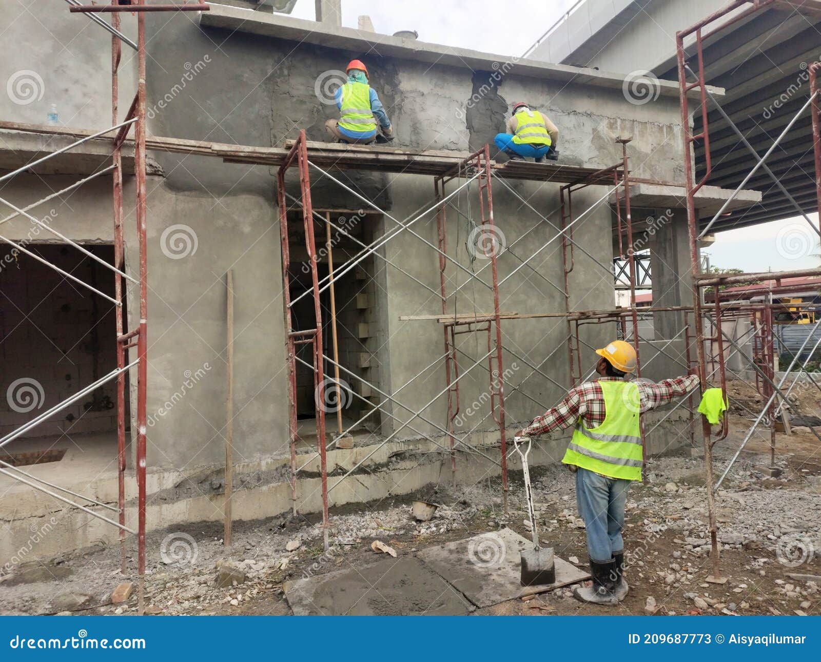 Plastering Work by Construction Workers Using the Cement Plaster ...