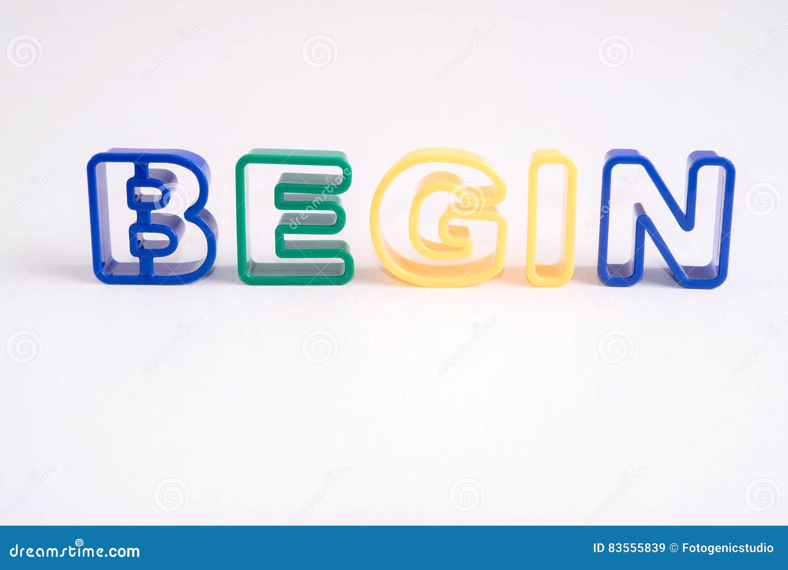 Plastic Alphabet on White Background with Word Begin Stock Image ...