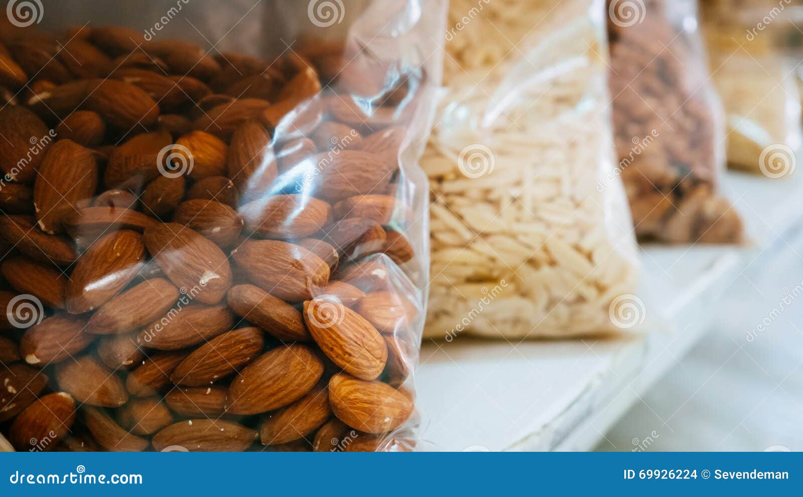Plastic bag of almonds. stock photo. Image of shell, almond - 69926224