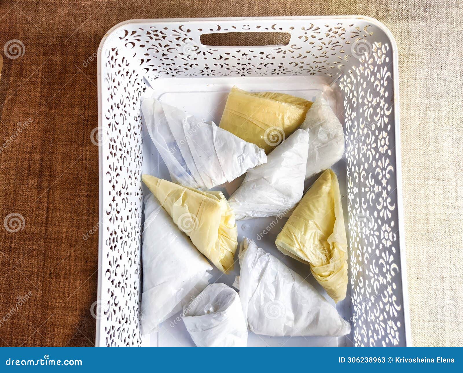 Plastic Bag Folded into a Triangle for Storage. Ways of Storing and ...