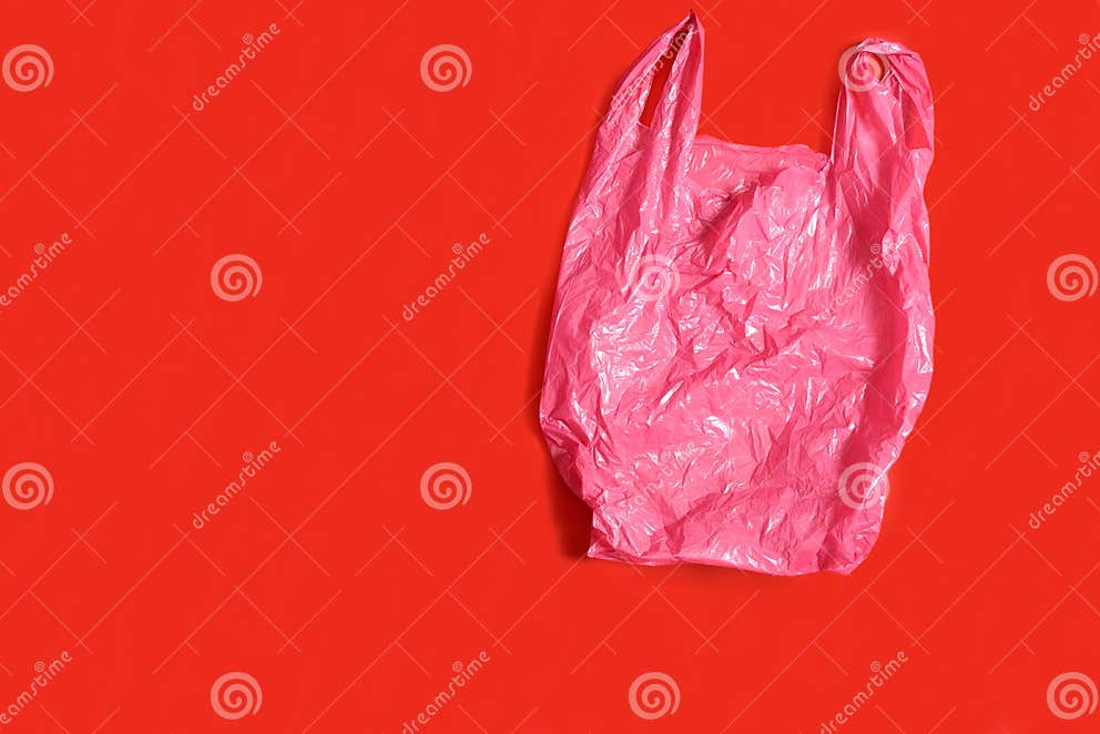 Plastic Bag on Red Background Stock Photo - Image of trash, wrinkled ...