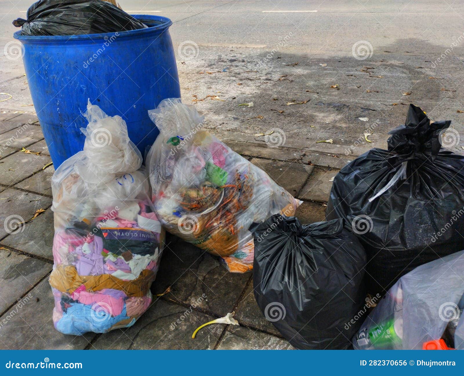 Plastic Bags and Garbage, Garbage Bins Full of Trash in the Public Area ...