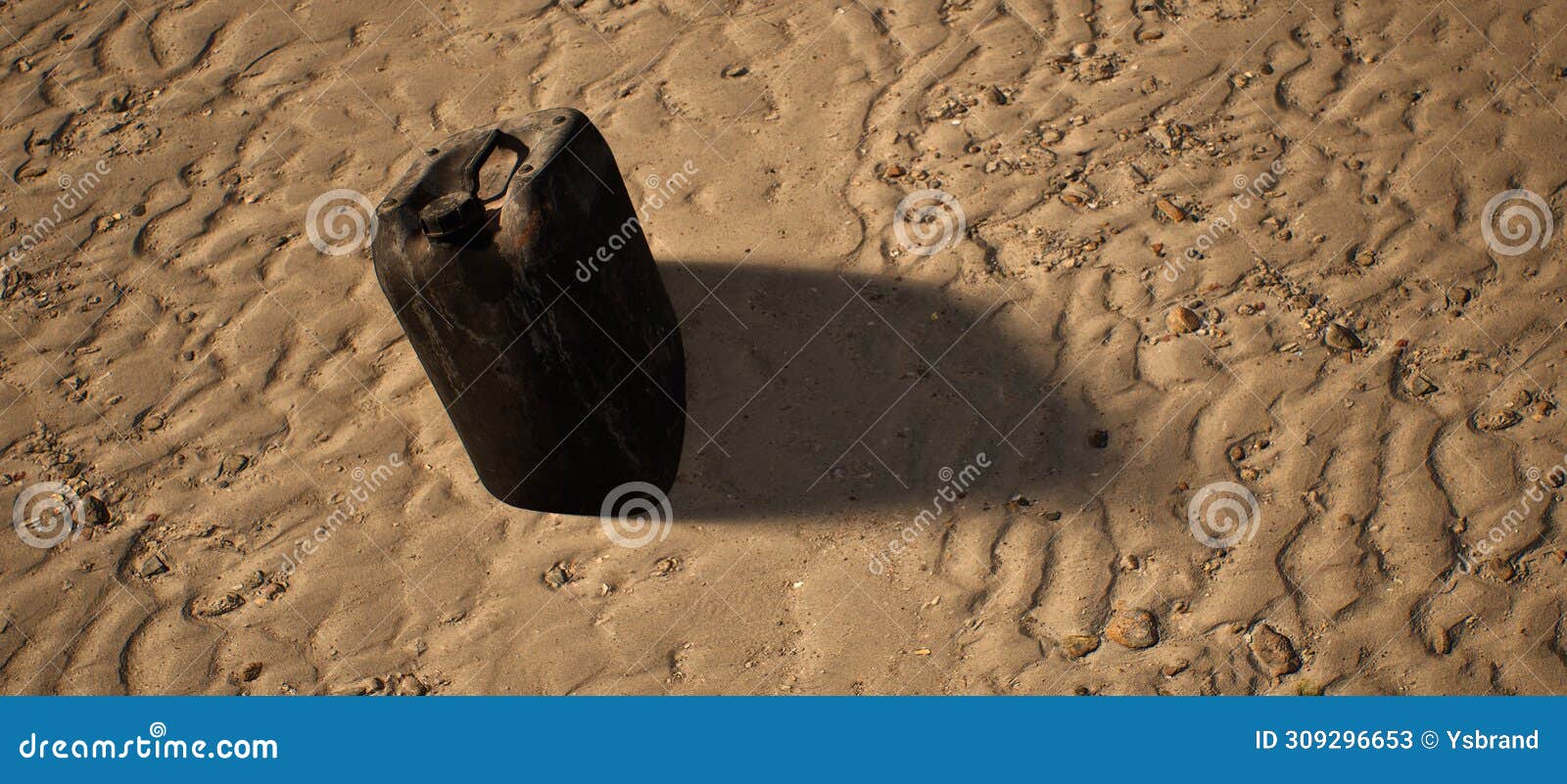 Plastic Black Container Lying in Rippled Sand of Beach. Stock ...