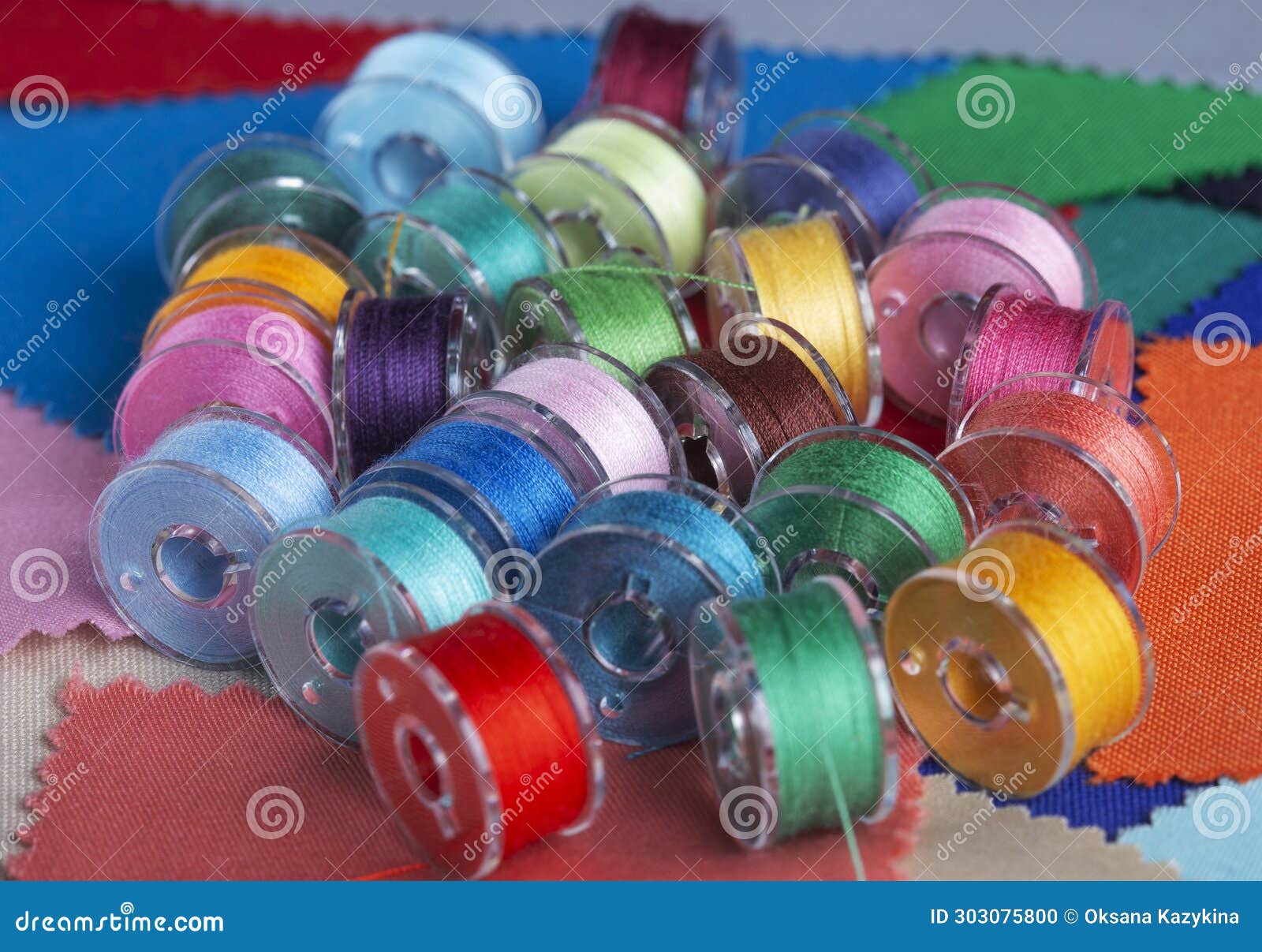 Plastic Bobbins for a Sewing Machine with Multi-colored Threads Stock ...
