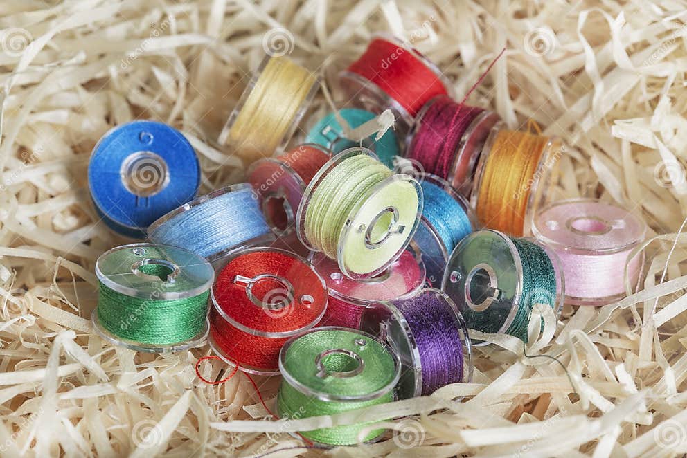 Plastic Bobbins for a Sewing Machine with Multi-colored Threads Stock ...