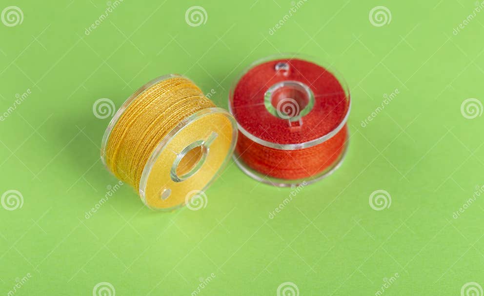 Plastic Bobbins for a Sewing Machine with Multi-colored Threads Stock ...