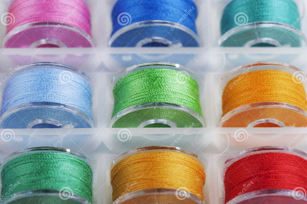 Plastic Bobbins for a Sewing Machine with Multi-colored Threads Stock ...