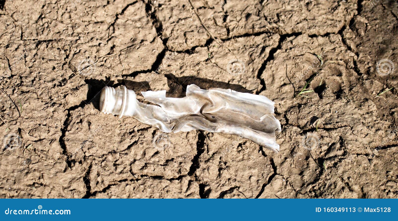 Plastic Bottle on the Beach Half Collapsed Stock Image - Image of ...