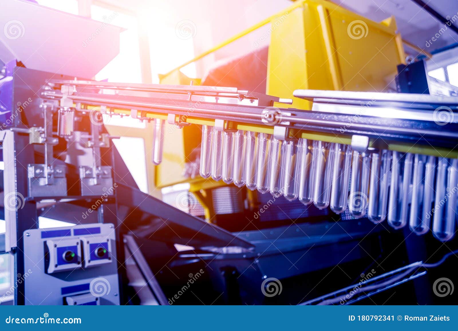 The Plastic Bottle Blowing Machine. PET Preforms for Blowing of Plastic ...