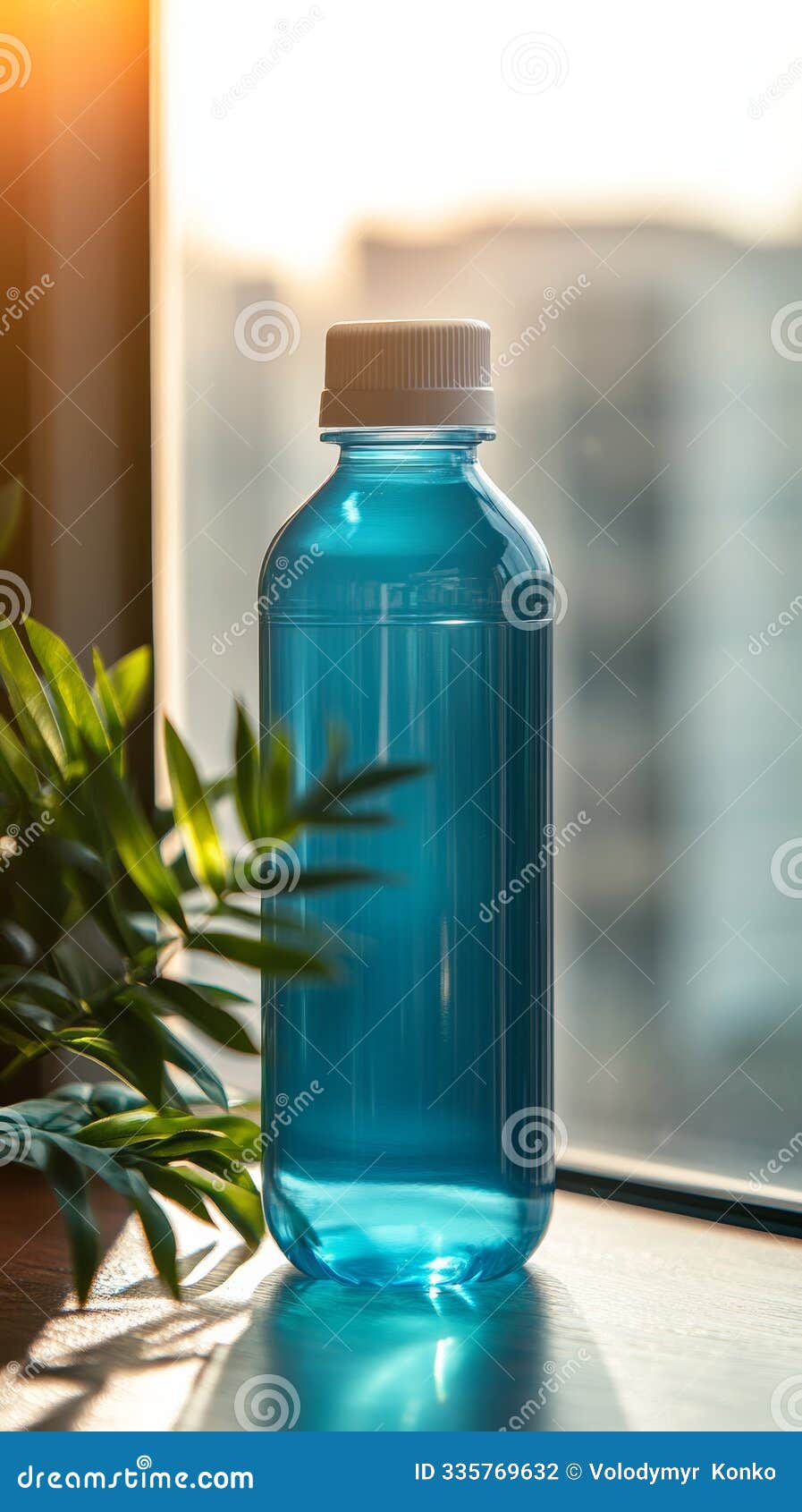 Plastic Bottle with Blue Liquid by Window, Nature and Hydration Concept ...