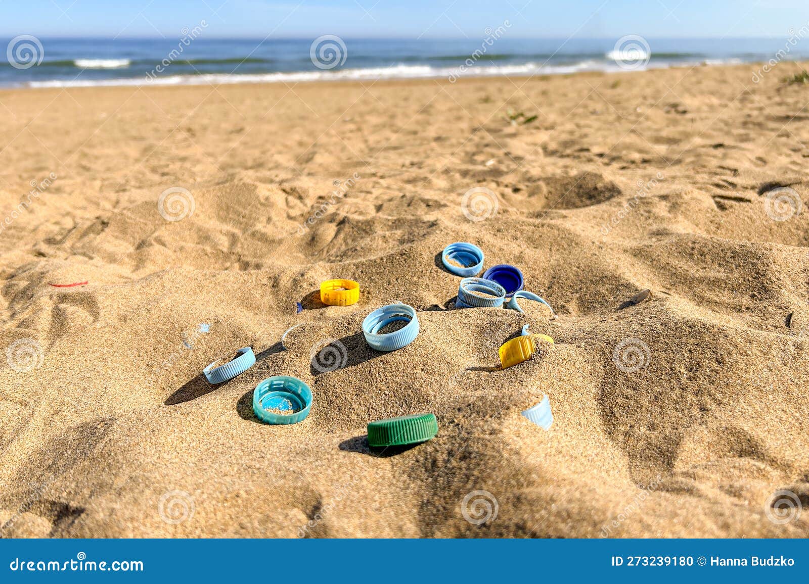 Plastic Bottle Caps Discarded on the Beach, Ecological Problem Stock ...