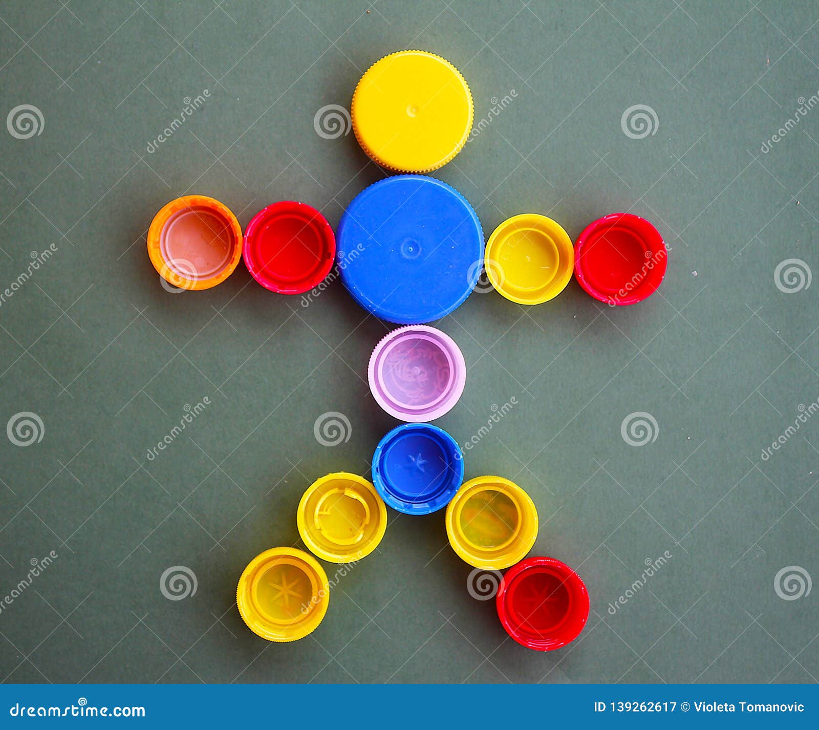Plastic Bottle Caps in the Form of a Man Stock Image - Image of color ...