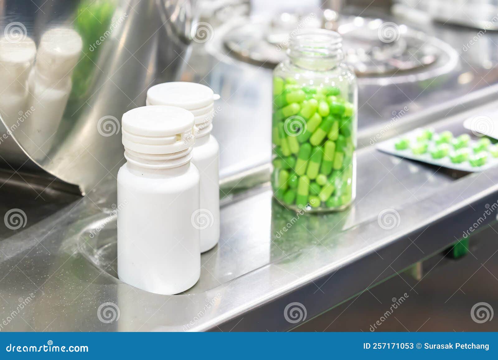 Plastic Bottle for Capsule on Stainless Steel Groove or Table of ...