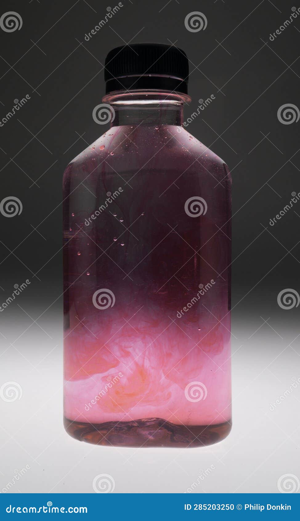 Plastic Bottle Containers with Food Colouring Mixing Creating Unique ...