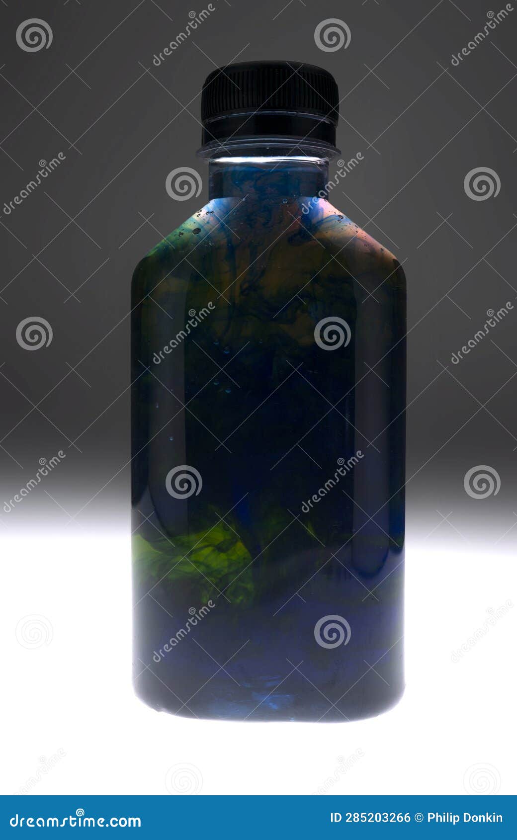 Plastic Bottle Containers with Food Colouring Mixing Creating Unique ...