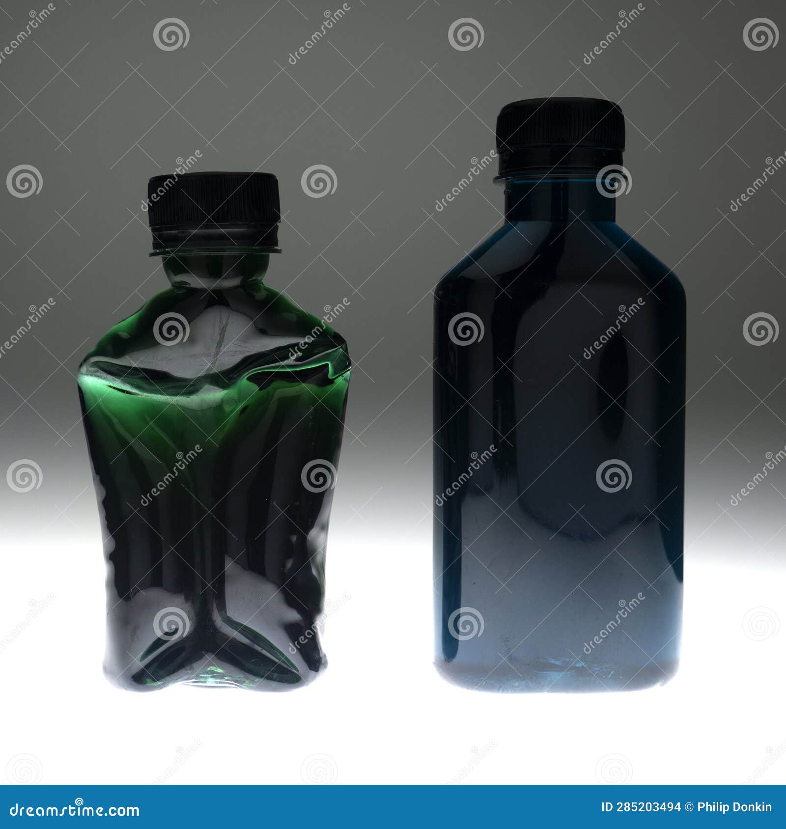 Plastic Bottle Containers with Food Colouring Mixing Creating Unique ...