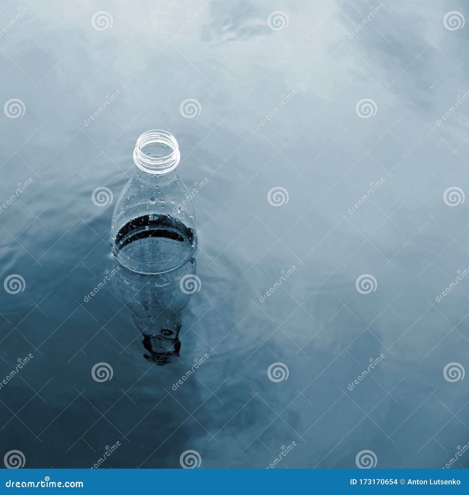 A Plastic Bottle Floating in River, Problems with Plastics Pollution ...