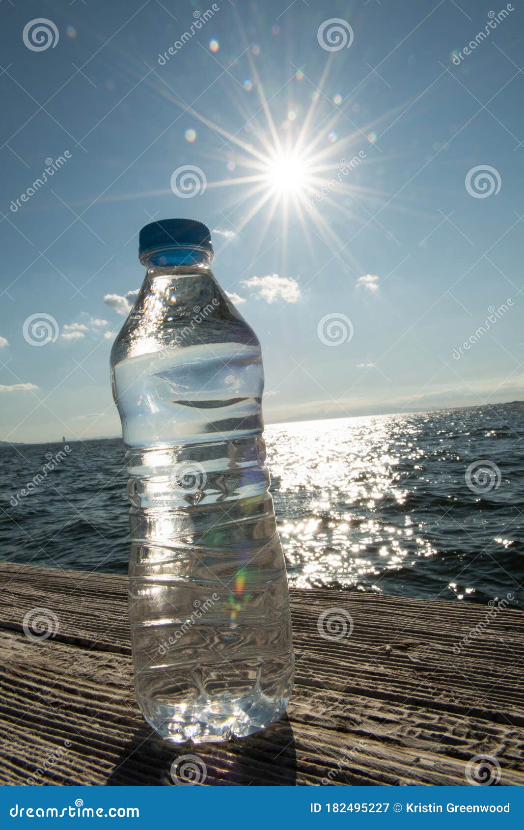 Plastic Bottle at the Waterfront Sun Flare Effect Stock Image - Image ...